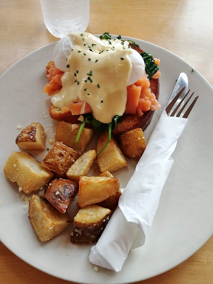 Eggs Benedict's fancy cousin has arrived, and it's wearing a salmon suit. Those potatoes look like they're ready to steal the show, too!