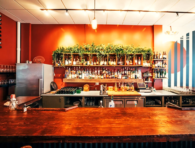 A seafood lover's dream platter - fresh oysters and jumbo shrimp lounging on ice like celebrities at a beach resort.