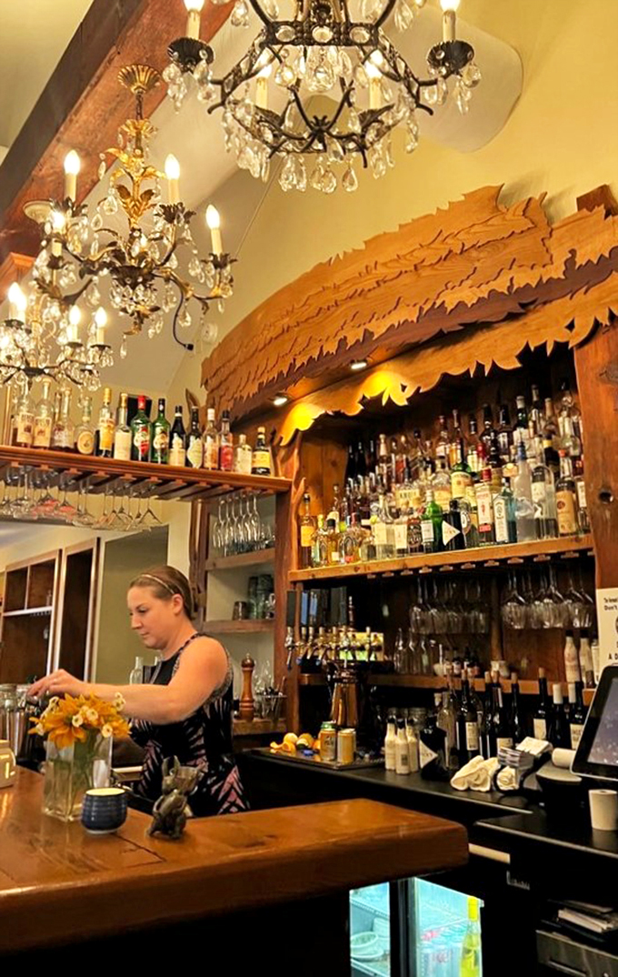 Chandeliers and charm! This bar could make James Bond trade his martini for a maple old-fashioned. Shaken, not stirred, of course.