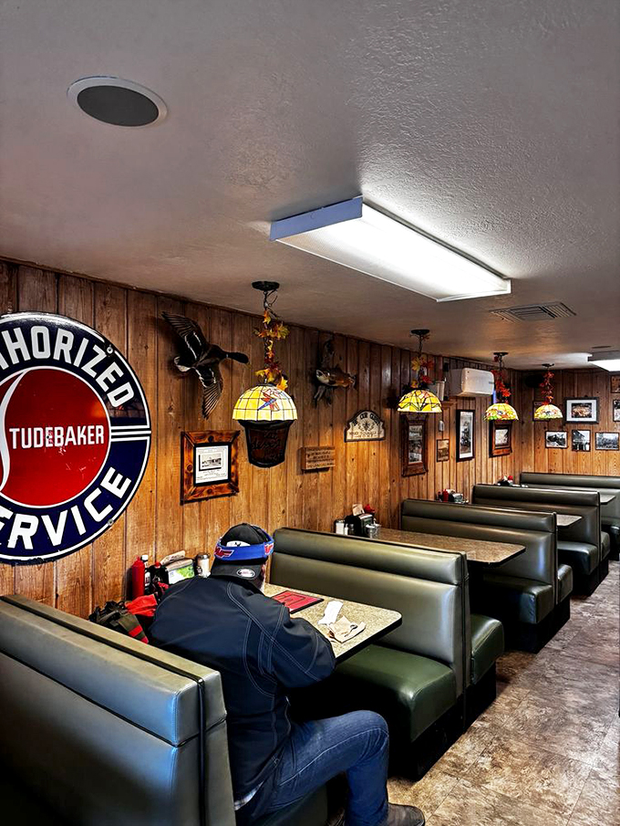 Slide into these booths and you might just solve the world's problems over a plate of eggs. The wood paneling whispers tales of decades gone by. Photo credit: Michael D.