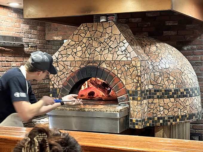 The pizza oven: Where dough dreams come true and toppings find their true calling. It's like a sauna for your soon-to-be dinner!