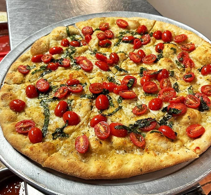 Who knew a garden party could happen on a pizza? This bruschetta pie is summer on a crust, with tomatoes doing the cha-cha.