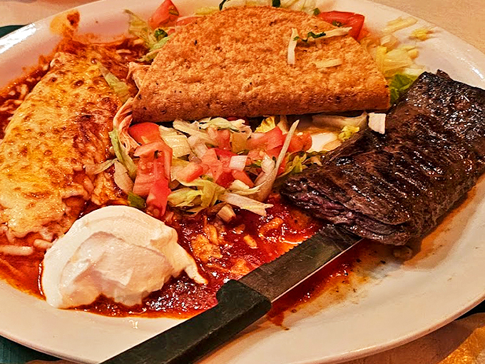 When enchiladas meet artistry: melted cheese cascades over perfectly seasoned filling, while fresh pico de gallo adds a bright finish.