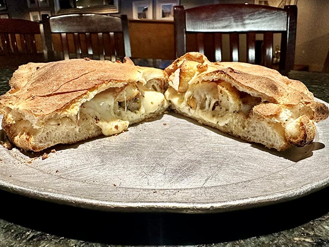Behold, the calzone that ate Manhattan! This chicken and potato behemoth is what comfort food dreams are made of.