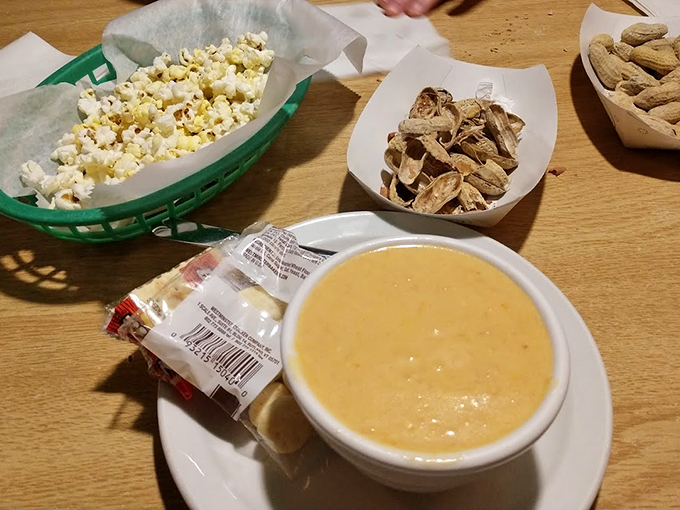 Simple pleasures: Fresh popcorn, peanuts, and a steaming bowl of comfort that makes winter worthwhile.