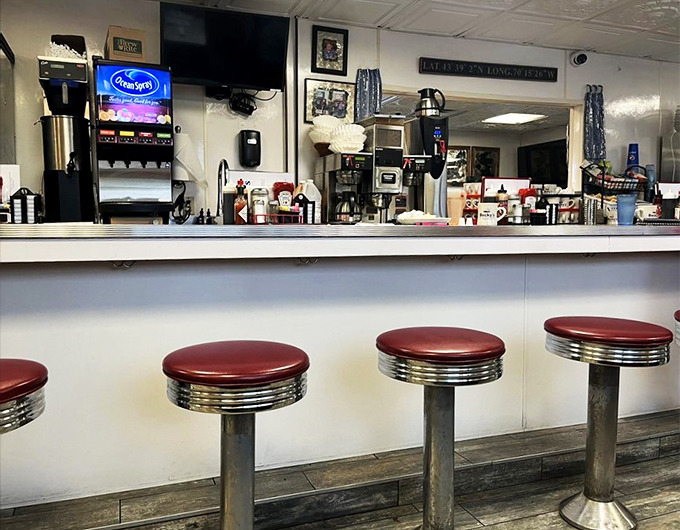 Chrome stools and coffee machines standing ready - it's like stepping into Edward Hopper's "Nighthawks," but with better coffee.