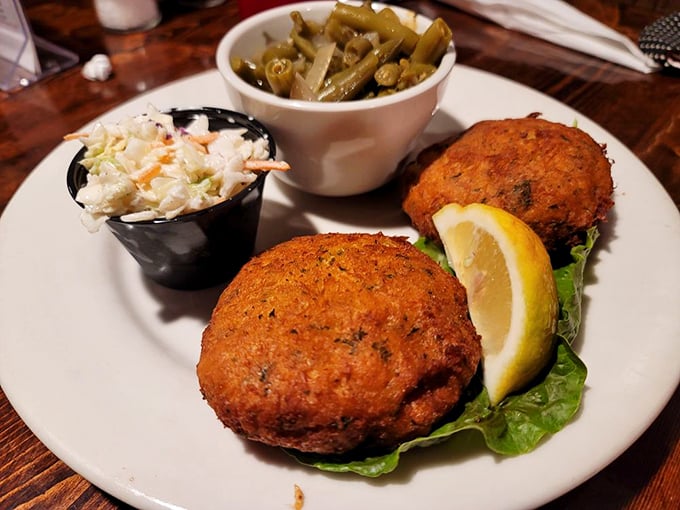Golden-brown crab cakes that would make Baltimore jealous, served with fresh slaw and crisp green beans.