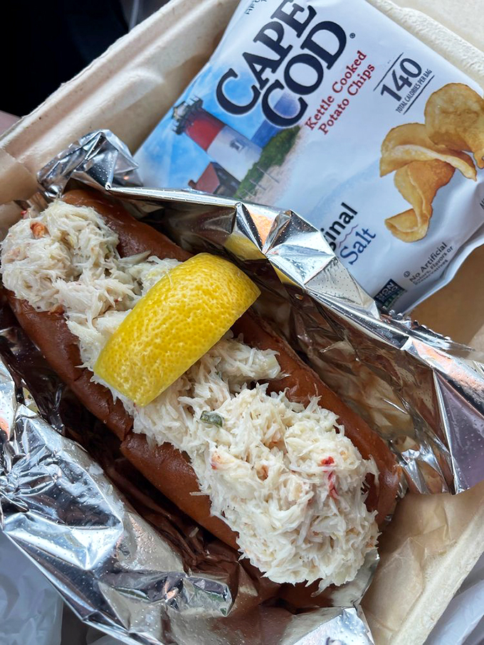 Behold, the star of the show! This crab roll is so packed, it's like the crustacean equivalent of clowns piling into a tiny car.