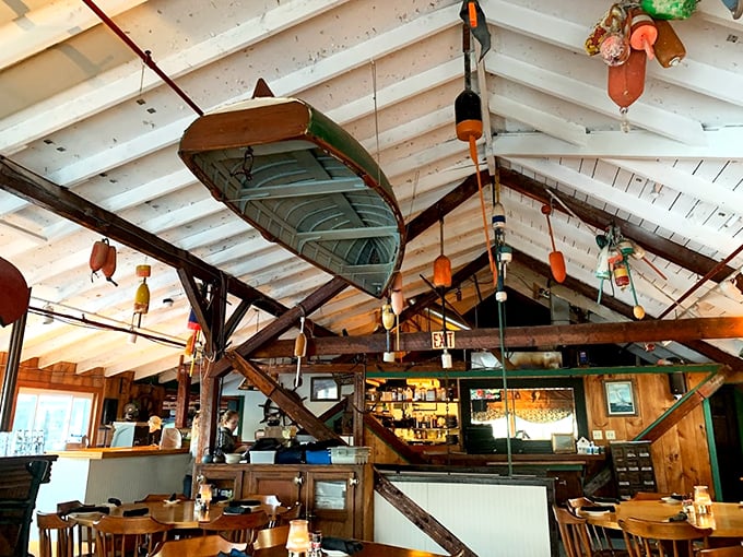 Look up! That vintage rowboat hanging from exposed beams tells you everything about Maine's maritime soul. Pure authenticity here.