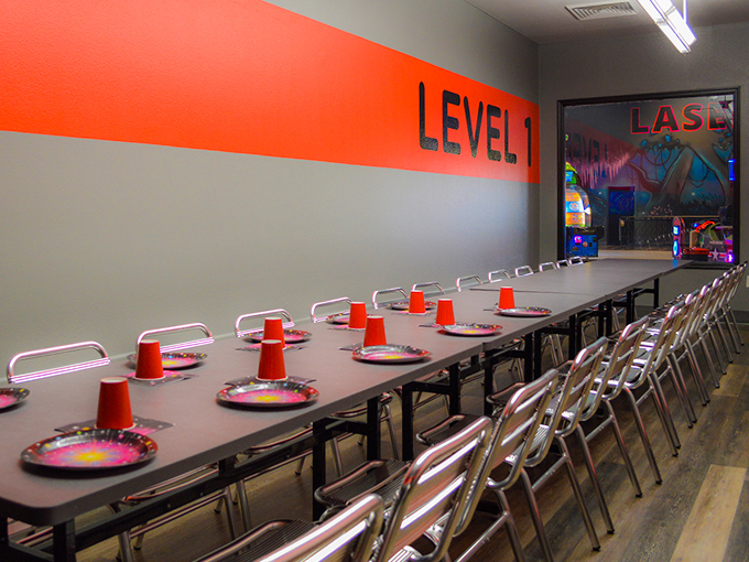 Level 1 dining area? More like "Level Fun"! This space is ready for birthday shenanigans or post-game celebrations. Photo credit: Jake's Unlimited