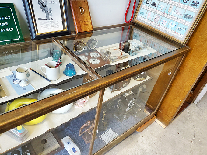 A glass case of emotion... and telephones! From rotary dials to push buttons, this display showcases the evolution of 'hello.'