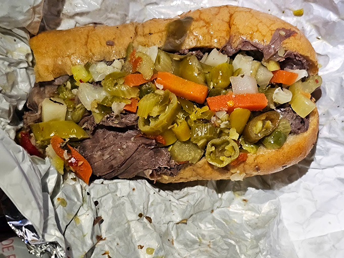 This Italian beef sandwich isn't trying to win beauty contests—it's too busy making taste buds dance with joy.