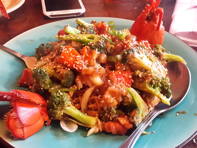 Fresh Maine lobster meets Chinese cuisine in this colorful lo mein, where East Coast meets Far East deliciously.