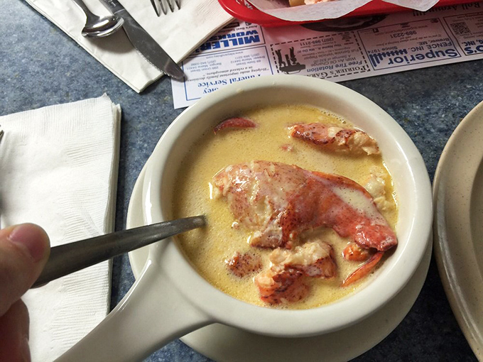 Look at those generous pieces of lobster basking in rich, creamy broth. It's like a warm hug from the ocean itself.