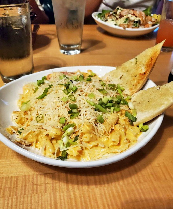 Mac and cheese reaches new heights with tender chunks of lobster and a golden crust that'll make you weak in the knees.