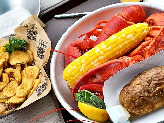 A whole Maine lobster dinner that makes you wonder why you ever eat anything else, served with summer-sweet corn and seasoned potatoes.