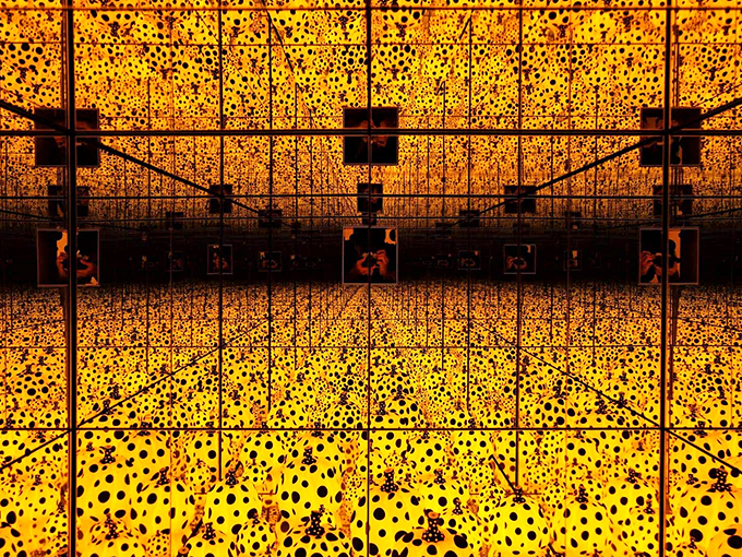 Imagine if someone captured twilight in a box - that's what Kusama's golden mirror room feels like.