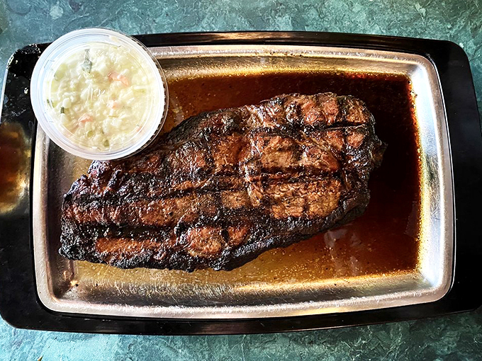 Behold the star of the show! This New York Strip isn't just a steak; it's a work of art that'll make your taste buds sing.