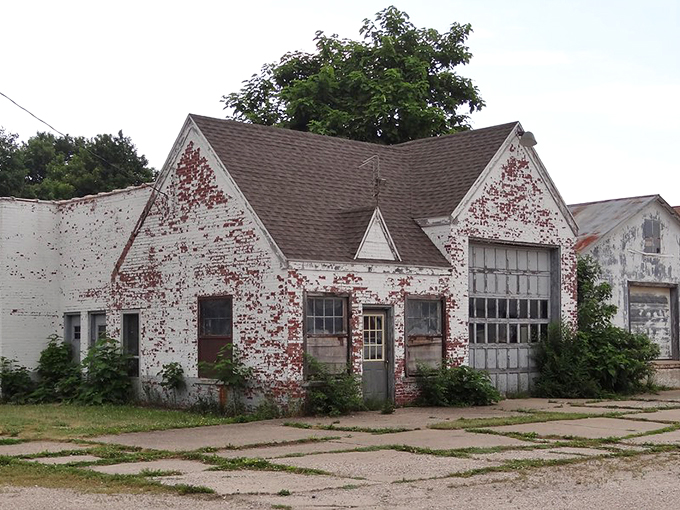 Time-worn brick and peeling paint tell stories of bygone businesses, a reminder of small-town America's evolving landscape.