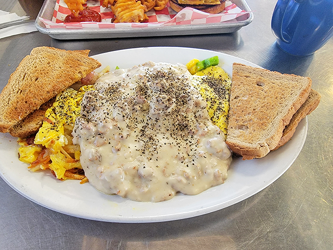 Gravy train coming through! This omelet's so smothered, it could moonlight as a warm, edible blanket on a chilly Michigan morning.
