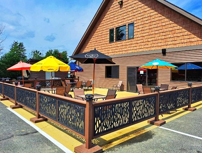 When Maine's weather plays nice, this stunning patio becomes everyone's favorite outdoor living room, complete with colorful umbrellas and good vibes.