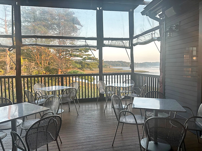 Mother Nature's dining room: A screened porch with water views that make every meal feel like a special occasion.