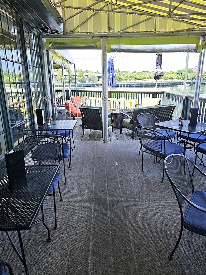 The outdoor deck feels like you're dining on a yacht, minus the seasickness. Perfect for those "I'm on vacation" moments with harbor views. Photo credit: matt house