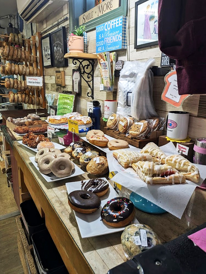 A display case that would make your grandmother proud - donuts, pastries, and treats lined up like edible works of art.