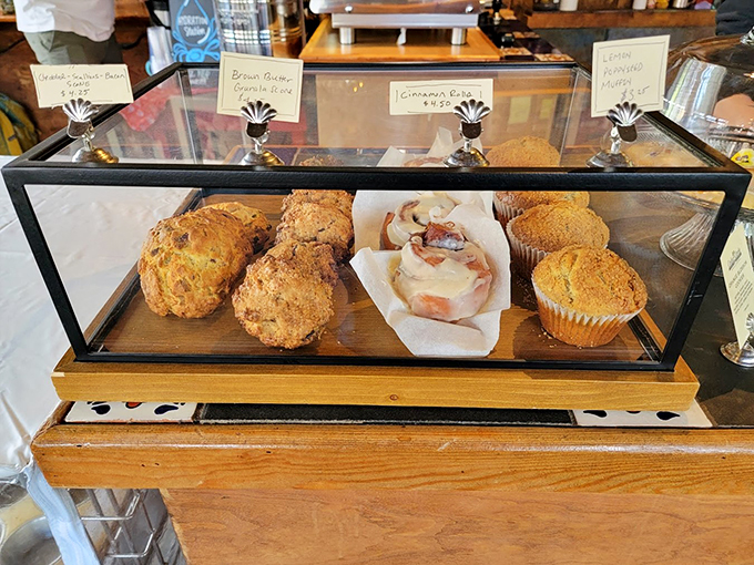 Behind glass, these scones and pastries pose like celebrities on the red carpet, each one ready for their close-up.