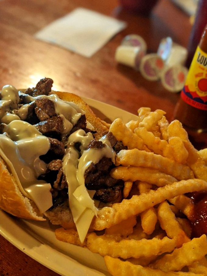 The star of the show: A Philly cheesesteak that's all business up front, party on the side with those perfectly crispy fries.