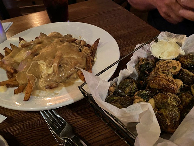 The ultimate duo: crispy poutine meets roasted Brussels sprouts. Because sometimes you need a little green with your gravy. Photo credit: Lisa D.