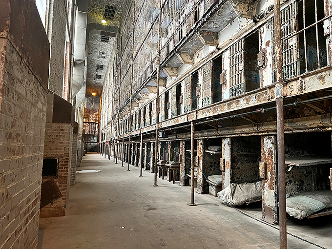 Rows of cells stretch into infinity, a haunting reminder of Shawshank's gritty realism. Can you hear the harmonica?