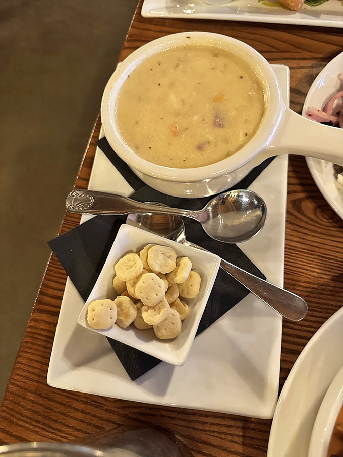 A steaming bowl of coastal comfort - each spoonful delivers a perfect medley of tender seafood and creamy broth.