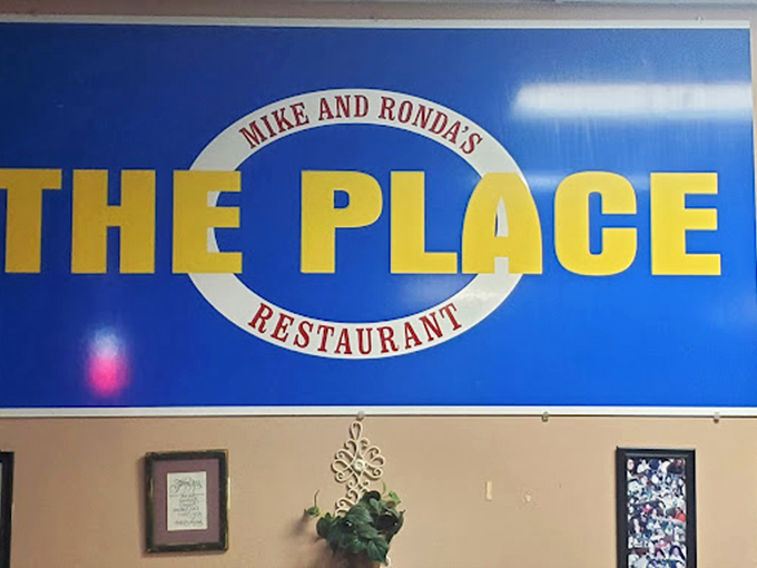 Bold blue letters announce "The Place" - because sometimes the simplest names hide the biggest flavors.