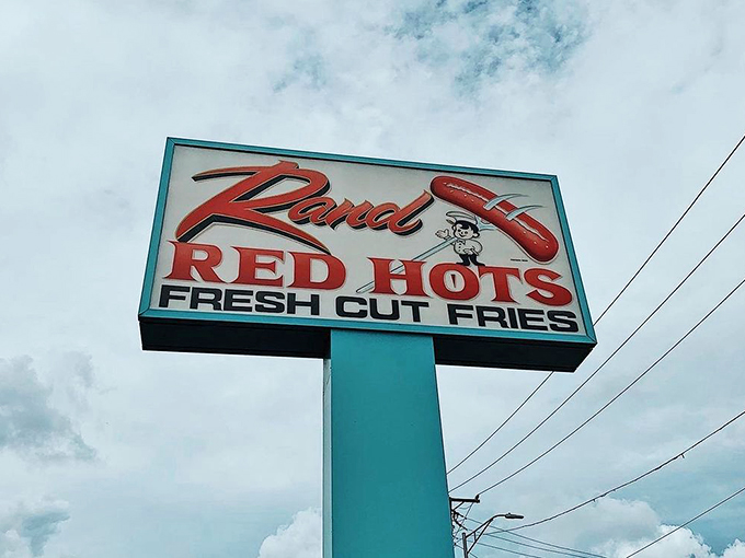 That retro sign with its jaunty hot dog mascot has been guiding hungry travelers to happiness since Eisenhower was in office.