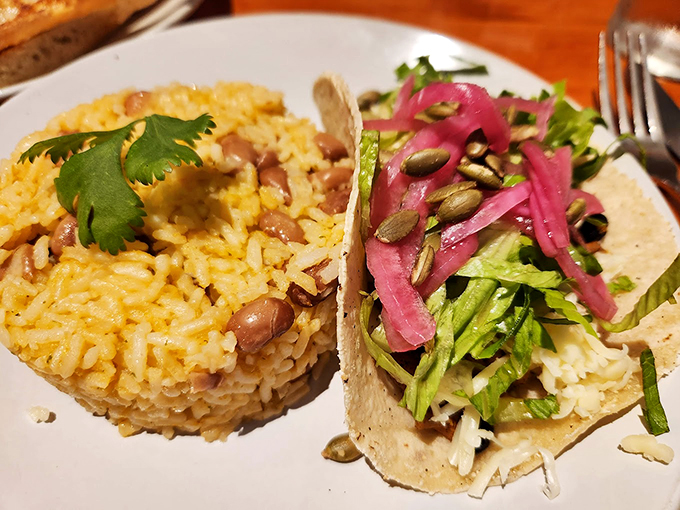 A perfect pairing: zesty tacos meet their soulmate in perfectly seasoned rice, while pepitas add that crucial crunch factor.