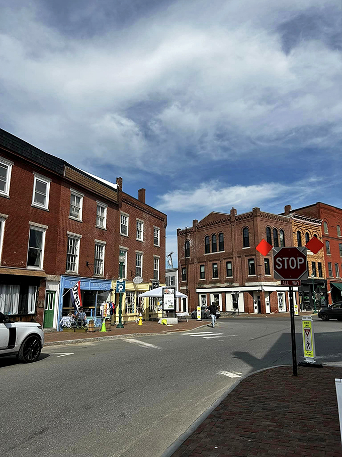 Red brick buildings stand tall, whispering tales of yesteryear. If these walls could talk, they'd probably ask for a fresh coat of paint.