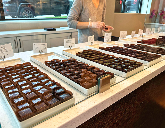 Truffles, truffles everywhere! NU Chocolat's display case is a treasure trove of cocoa jewels, each one a miniature masterpiece waiting to be savored.