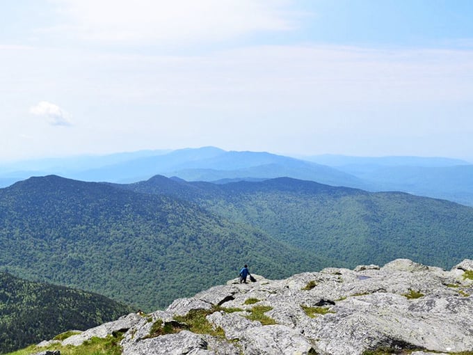 Top of the world, Ma! This summit view is so breathtaking, it's like Mother Nature's own IMAX theater, minus the overpriced popcorn.