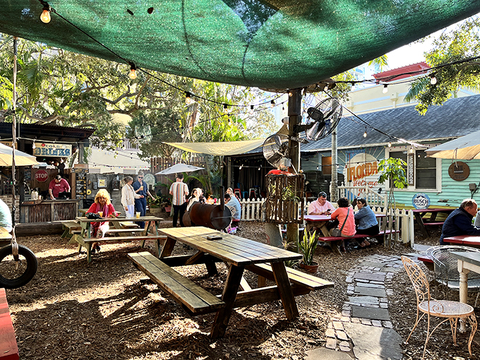 Backyard bliss or secret garden? This outdoor dining area is where Mother Nature and comfort food join forces for a magical meal experience.