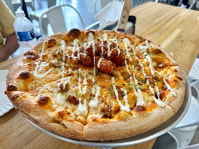 Buffalo chicken pizza that's hotter than Florida asphalt in August. One bite and you'll be doing a happy dance that would put "Dancing with the Stars" to shame. Photo credit: Candace Lewis