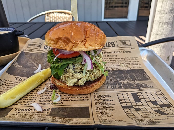 Hold the phone! This isn't just a burger, it's a skyscraper of satisfaction. Bet it's taller than the last Florida snow drift. Photo credit: Heather
