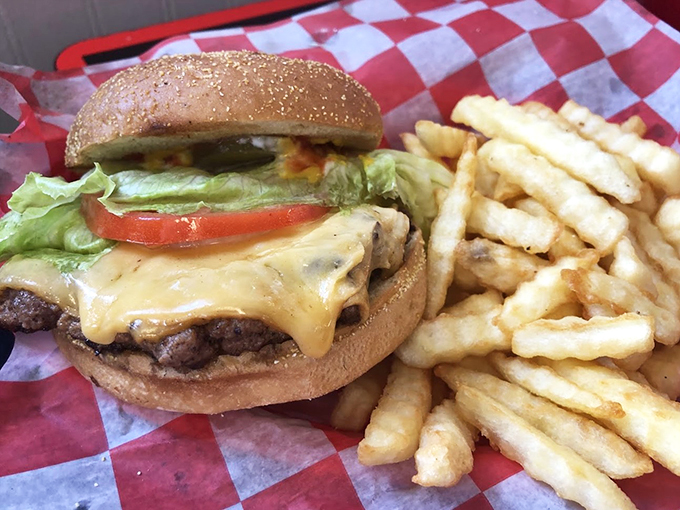 Meet your new comfort food crush! This classic cheeseburger and crispy fries duo is like a warm hug for your taste buds.
