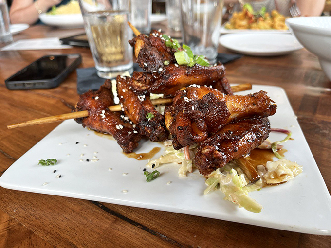 Holy hot wings, Batman! These sticky, glazed beauties are what happen when chickens dream of becoming candy. Photo credit: Thiago Prado