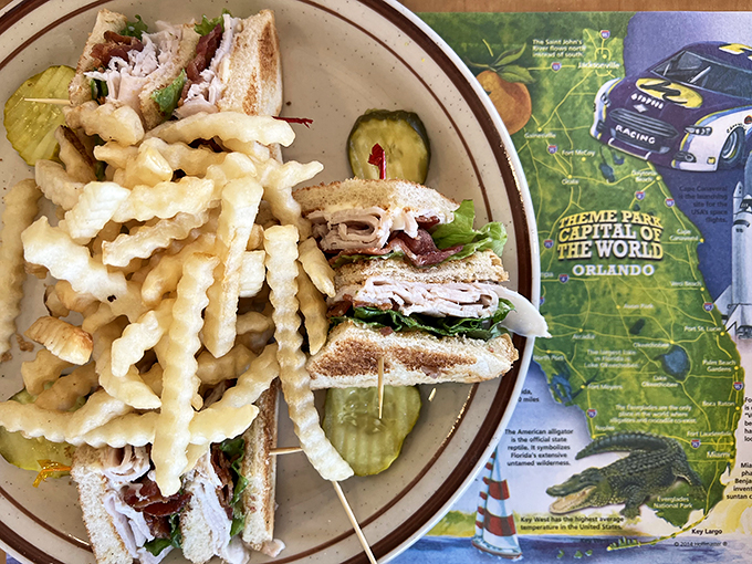 The club sandwich that puts country clubs to shame! Layer upon layer of deli delights, stacked higher than a Jenga tower and twice as satisfying. Photo credit: Christine Caven