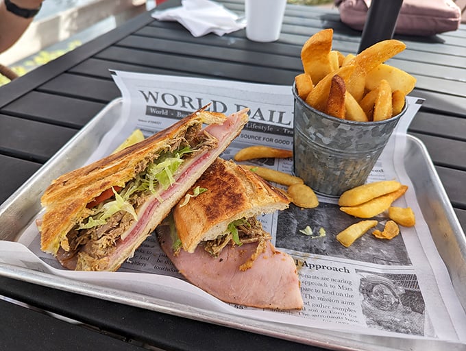 Hold the front page! This Cuban sandwich is making headlines with its perfectly pressed perfection. Extra! Extra! Read all about it - with your taste buds. Photo credit: Angel C.