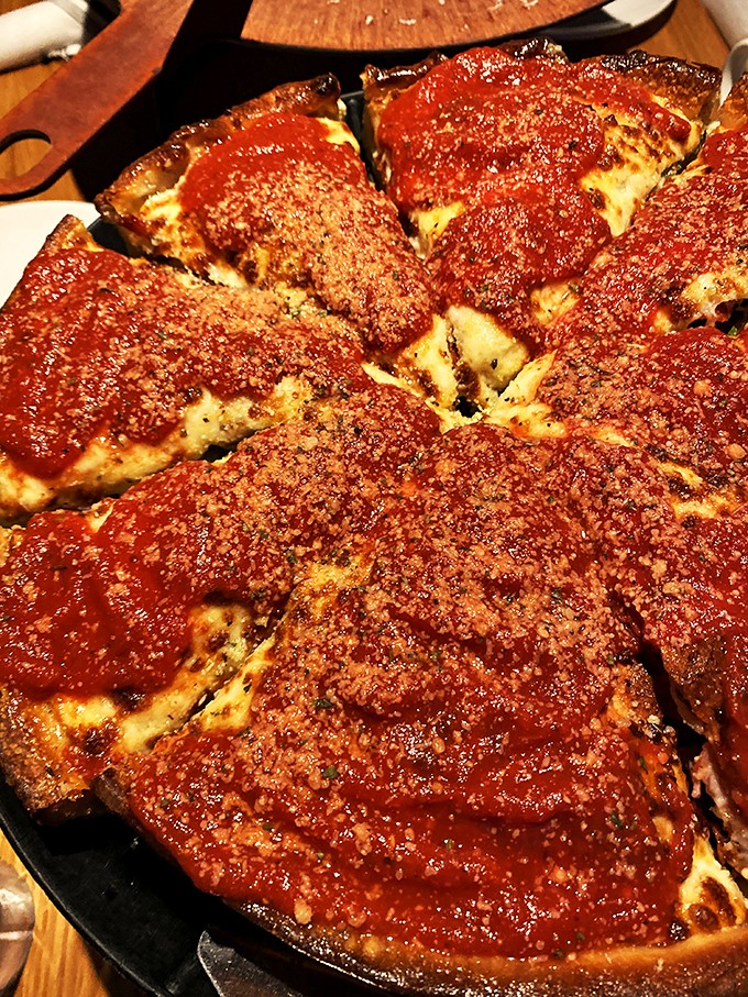 Holy cheese, Batman! This deep-dish beauty is so packed with toppings, it's practically a savory layer cake masquerading as pizza.