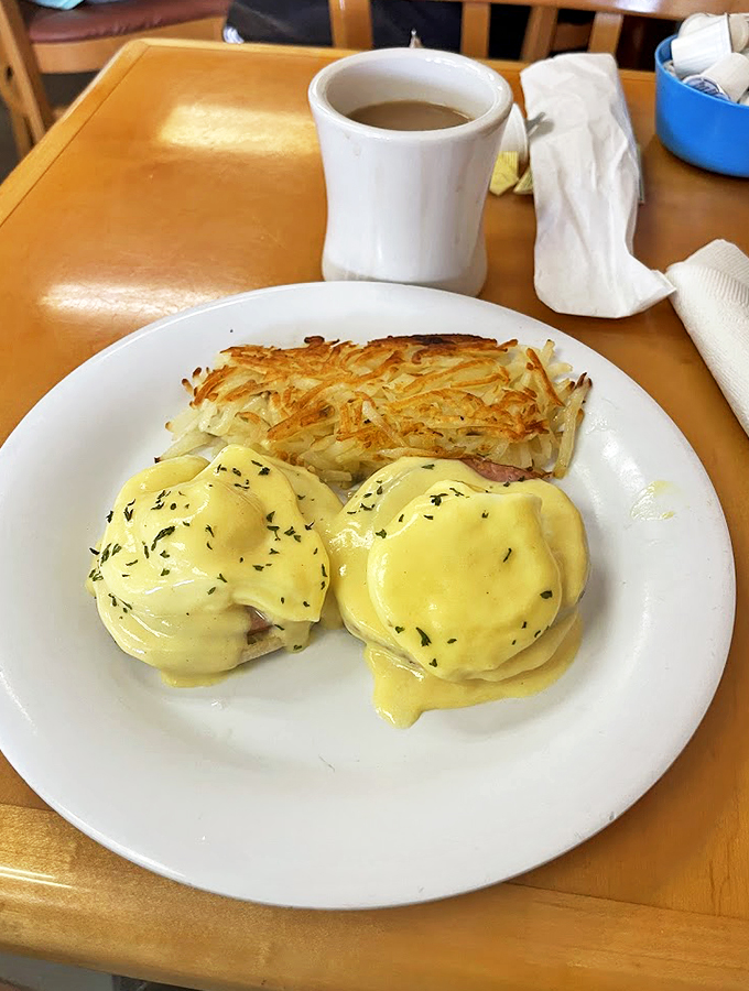 Eggs Benedict: where breakfast meets art. These golden orbs of hollandaise-draped perfection are ready for their close-up!