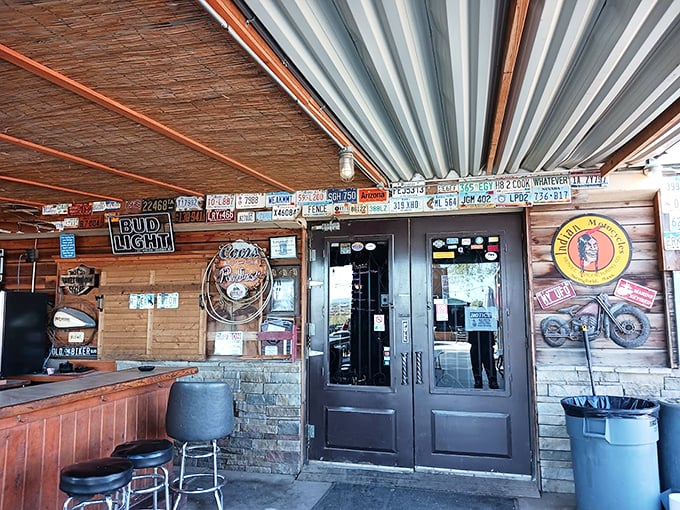 Step through these doors and into a world where license plates are wallpaper and every sip tells a story. Photo credit: Burl &ldquo;Kent&rdquo; Johnson