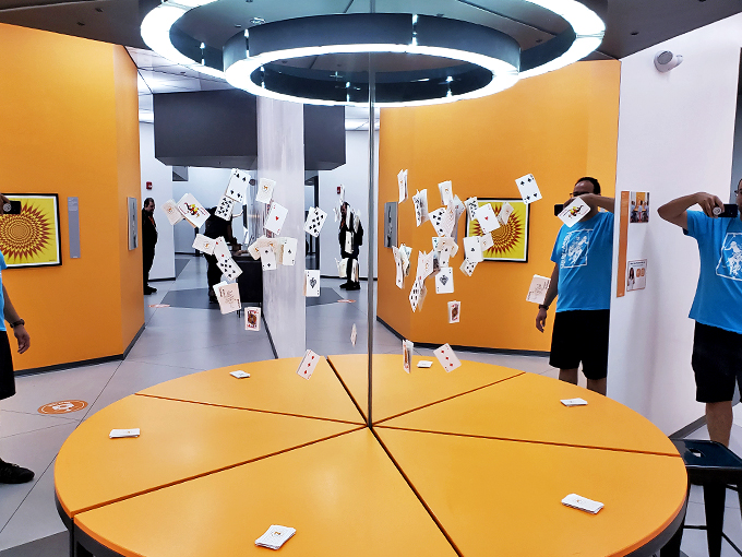 Is this what happens when a magician's deck of cards goes rogue? This mesmerizing display will have you wondering if you've stumbled into a high-stakes game of 52 Pick-Up.